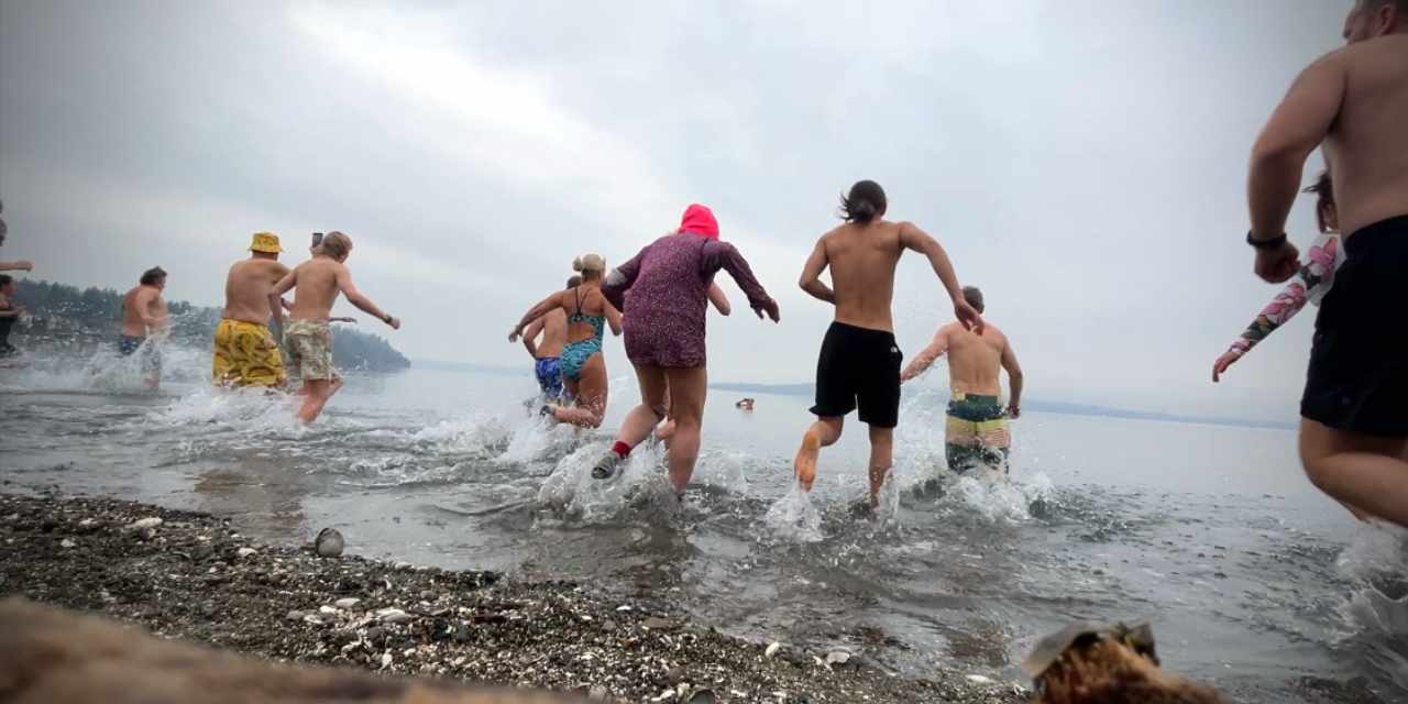 VIDEO/PHOTOS: Local father and son complete 4 Polar Bear Plunges in one ...